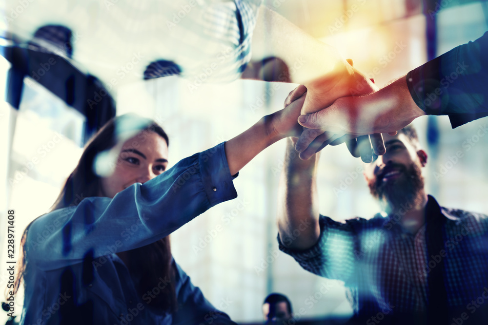 Handshaking business person in office. concept of teamwork and ...