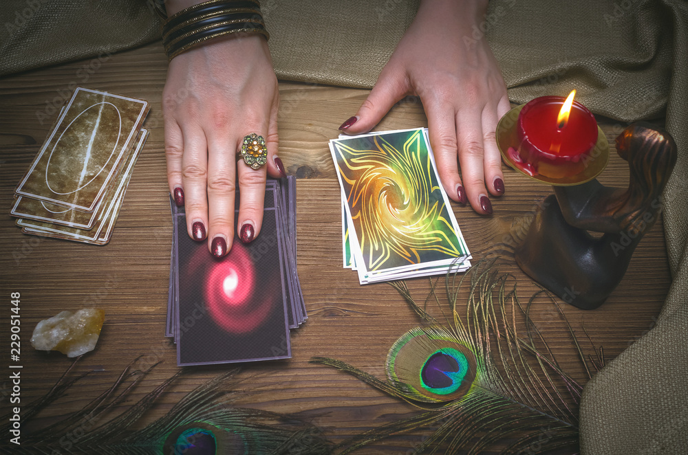 Tarot cards on fortune teller desk table background. Futune reading ...