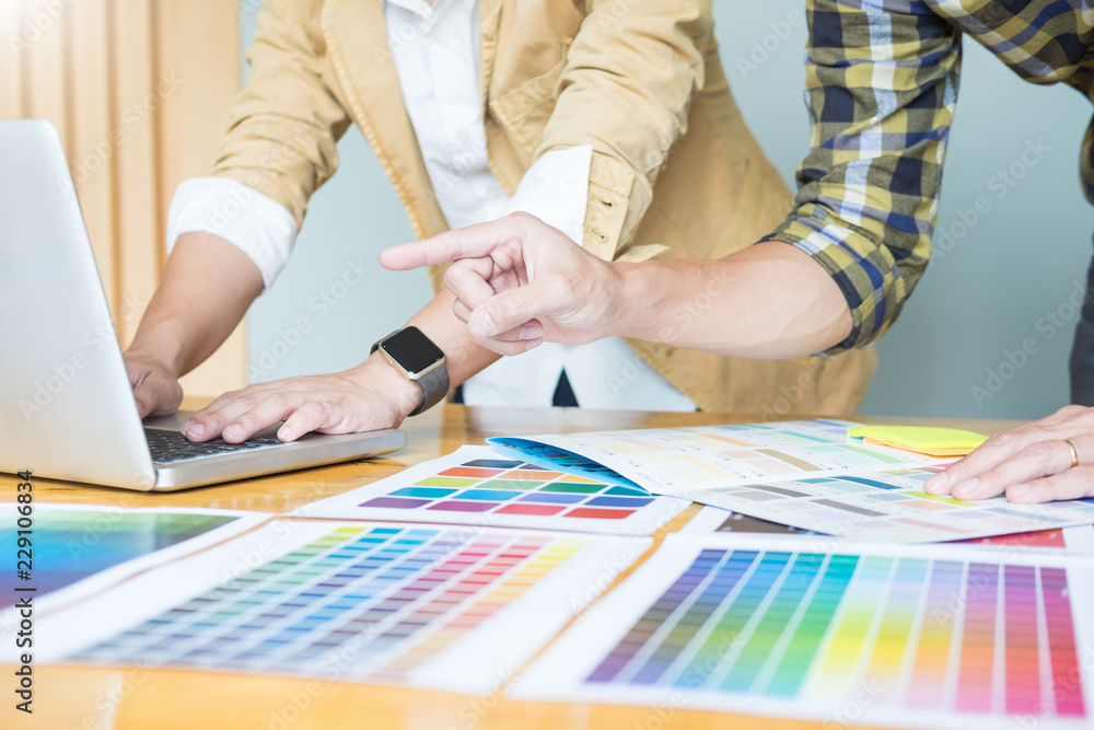 Creative Graphic designer at work. Color swatch samples pantone palette ...