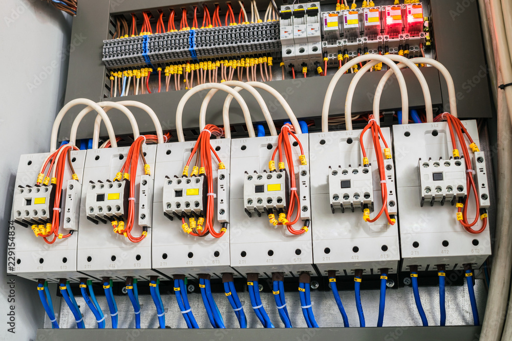 A modern open fuse box contains a lot of automata, connectors, relays ...