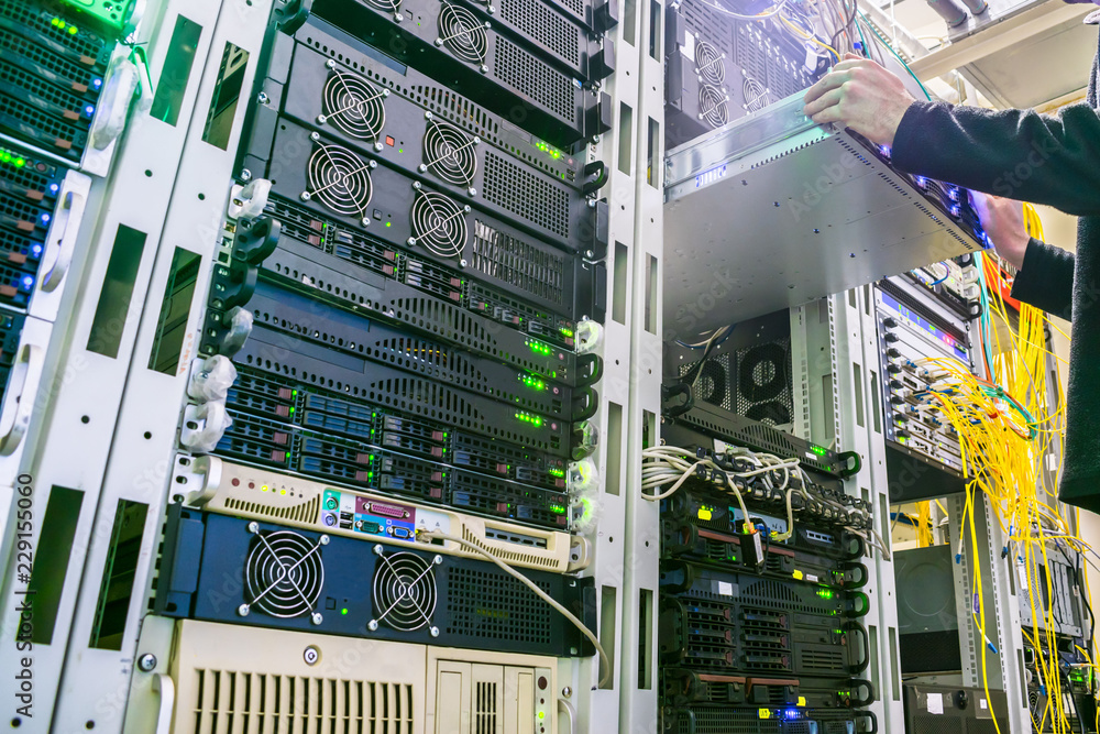 Emergency equipment replacement in the server rack. Work with computer ...