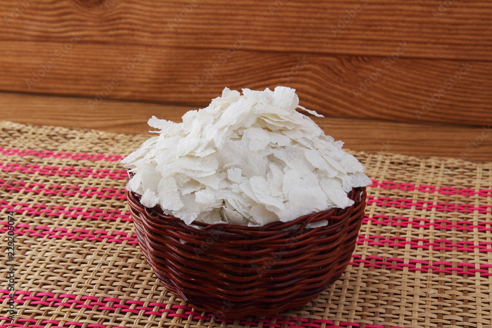 uncooked puffed rice flakes poha in basket for indian gujarati ...