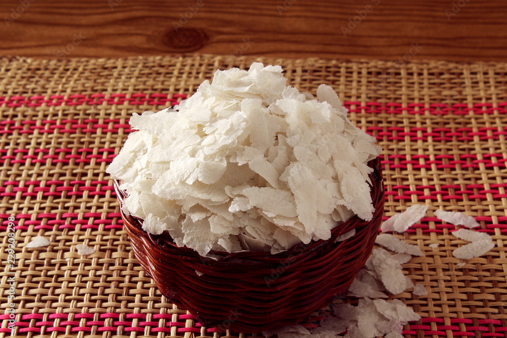 uncooked puffed rice flakes poha in basket for indian gujarati ...