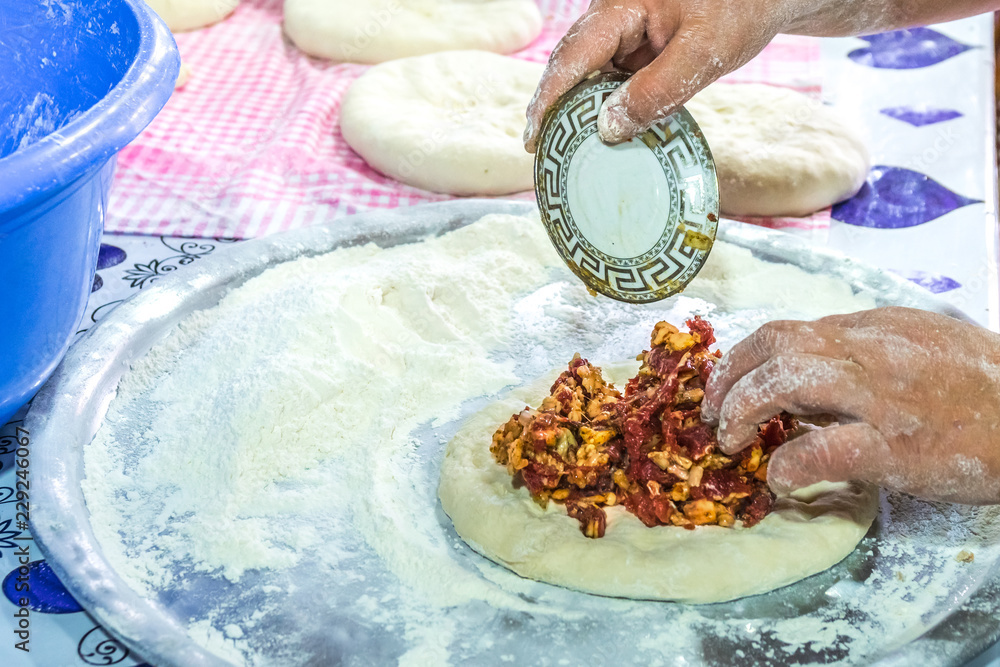 Coocing the traditional Georgian dish kubdari with meat, Svaneti Stock ...
