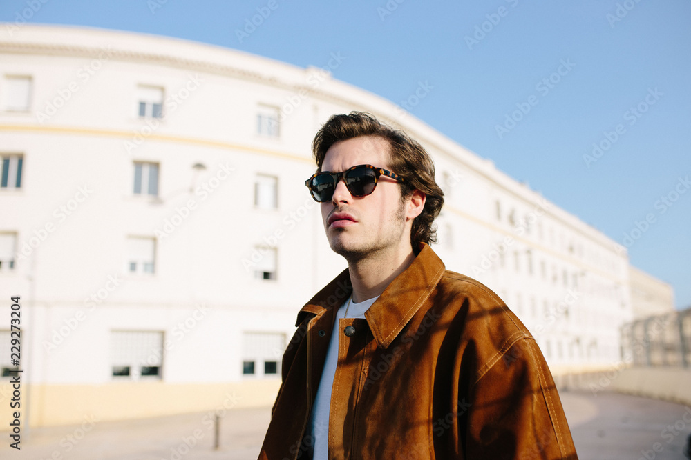 Stylish male model in sunglasses Stock Photo | Adobe Stock