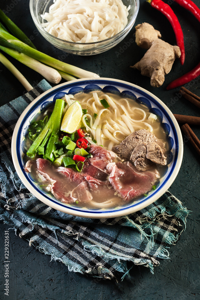 Pho Bo - raw beef noodle soup Stock Photo | Adobe Stock