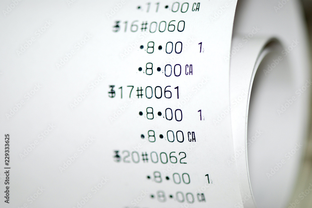 ROLLO DE PAPEL CONTABLE. CAJERO Stock Photo | Adobe Stock