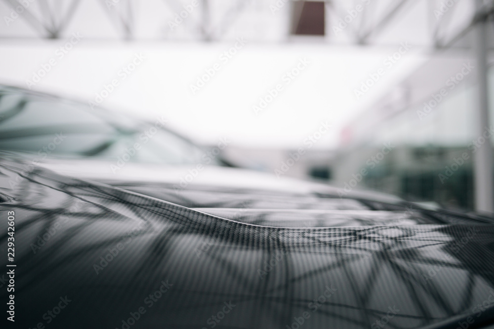 Car carbon hood texture with reflections Stock Photo | Adobe Stock