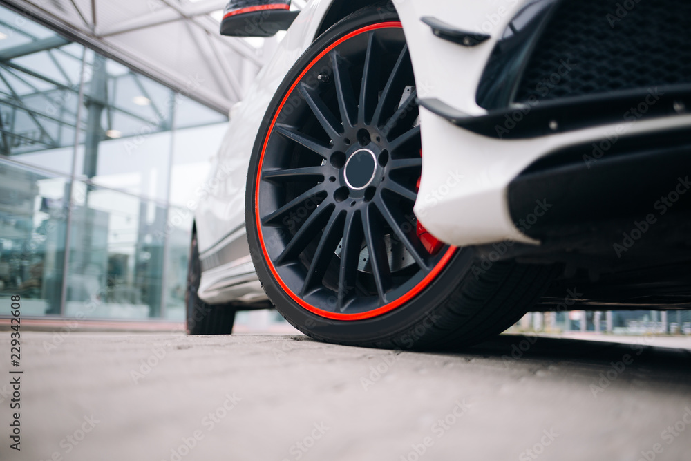 Front wheel of modern car Stock Photo | Adobe Stock