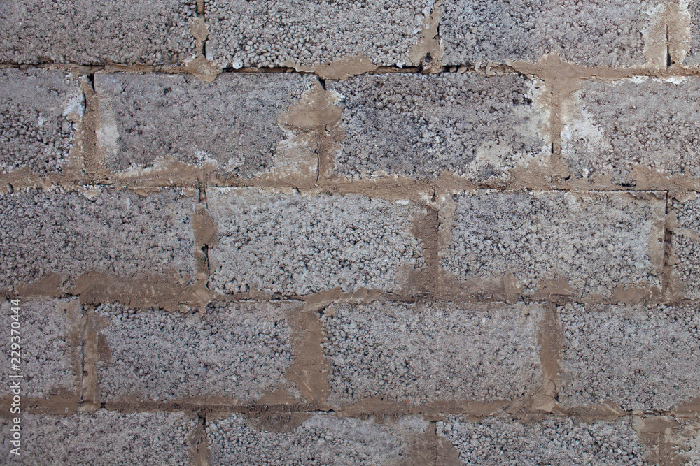 Old wall made of expanded clay blocks for background and design. Grunge ...