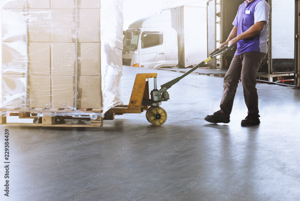 Workers Unloading Packaging Boxes on Pallets to The Cargo Container ...
