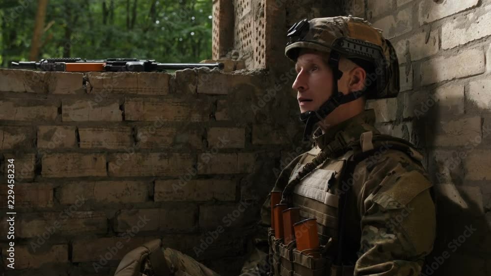 Vidéo Stock Distraught soldier in combat uniform suffering post ...