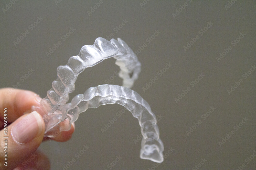 Transparent dental orthodontics to correct dental alignment Stock Photo ...