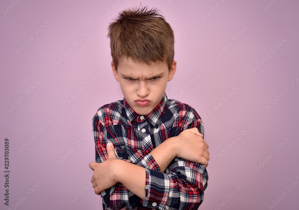 Angry and pouting cute young boy with crossed arms Stock Photo | Adobe ... Angry and pouting cute young boy with crossed arms Stock Photo | Adobe ...
