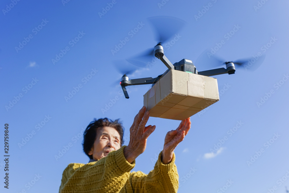 Drone delivery service Stock Photo | Adobe Stock