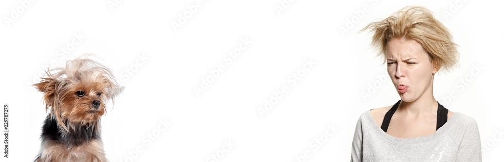 The funny woman and her dog with suspicious mistrustful look over white ...