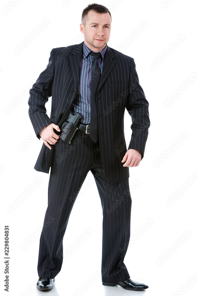 Full-length portrait of a classy businessman or mobster or security ...