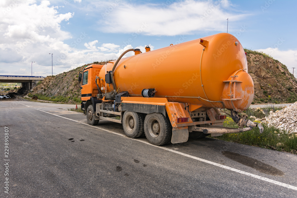 Tank truck to transport water or liquids for construction Stock Photo ...