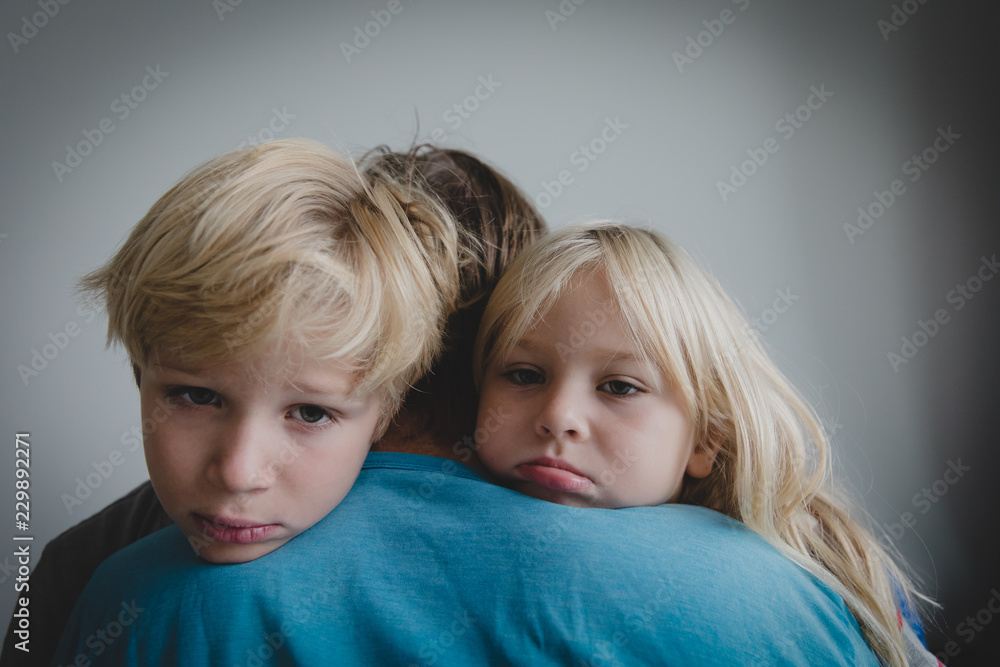 Two Sad Boys Hugging