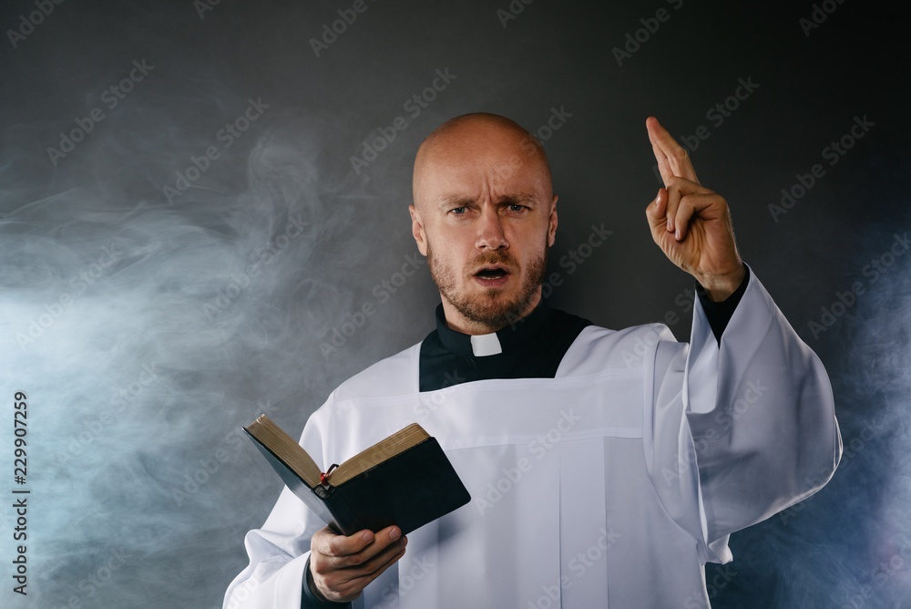 White And Black Catholic Priest