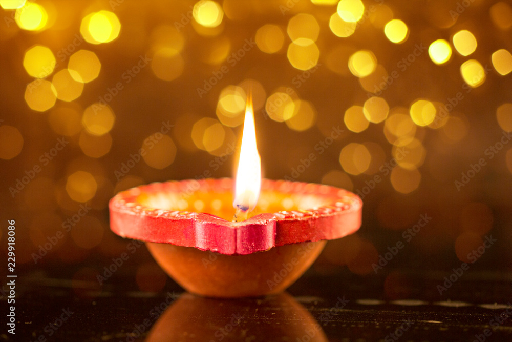 Happy Diwali Clay Diya lamps lit during Dipavali Hindu festival of ...