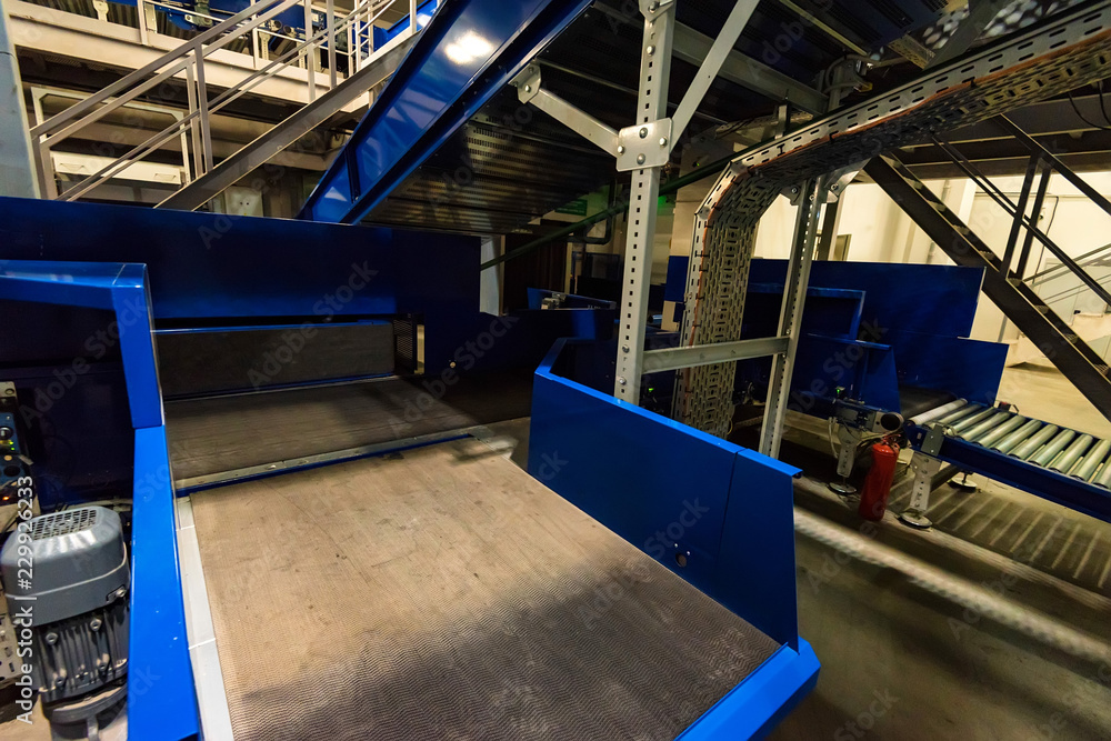 Baggage sorting center with empty baggage carousels Stock Photo | Adobe ...