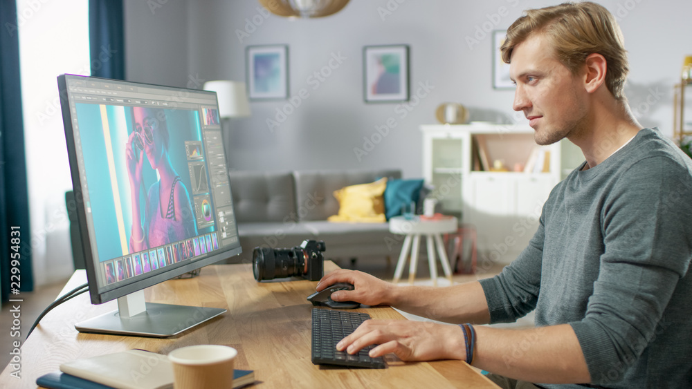 Professional Photographer Works in Photo Editing App / Software on His ...