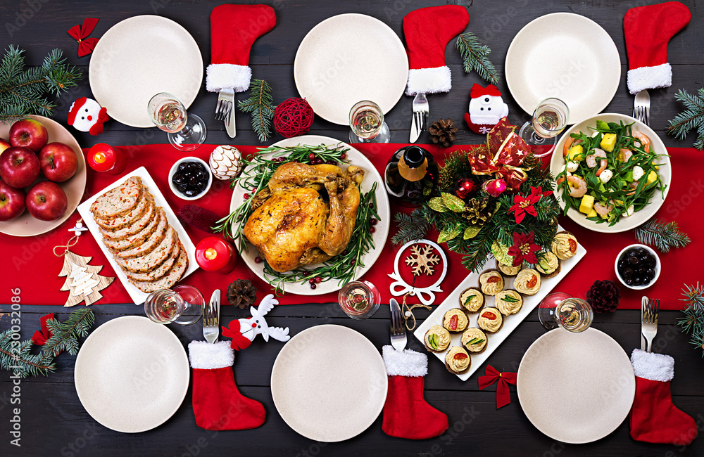 Baked turkey. Christmas dinner. The Christmas table is served with a ...