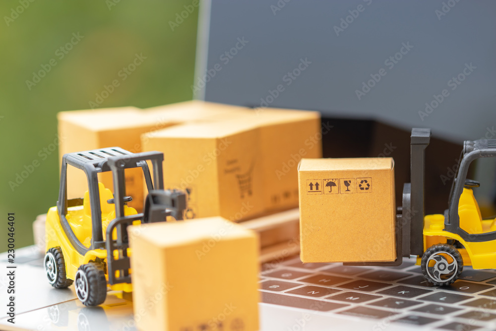 Mini forklift truck load cardboard box with symbols (up, recycle ...