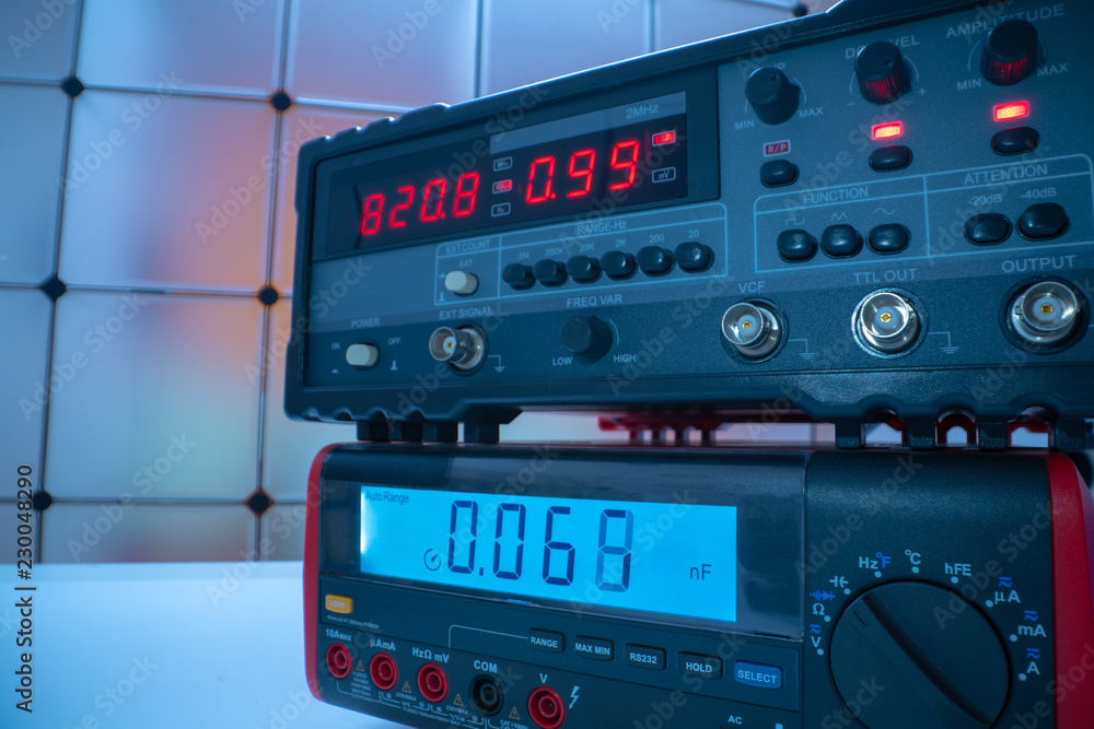 Electronic measuring instrument. Function generator and Multimeter ...