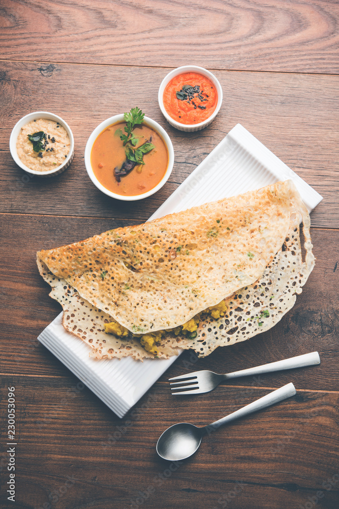 Onion rava masala dosa is a South Indian instant breakfast served with ...