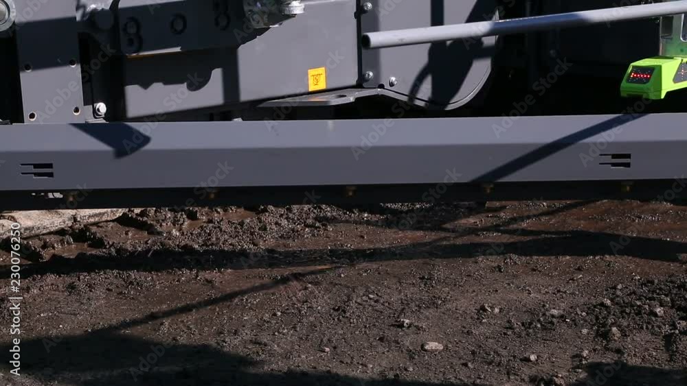 Ultrasonic, laser paver sensors. Work asphalt paver. spattering nozzles ...