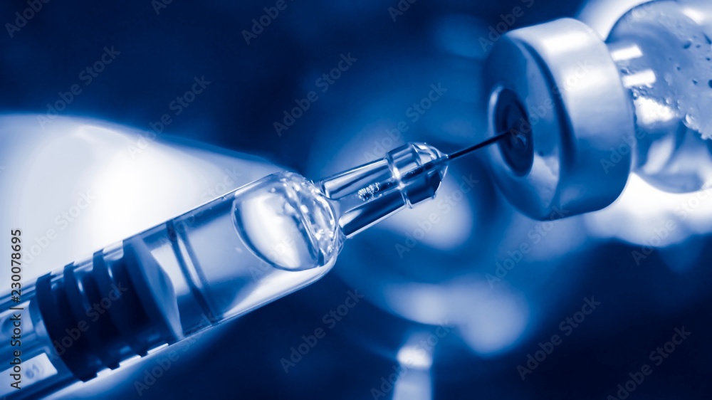 Vaccine vial dose flu shot drug needle syringe,medical concept ...