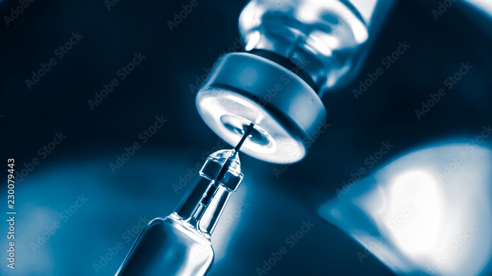 Vaccine vial dose flu shot drug needle syringe,medical concept ...