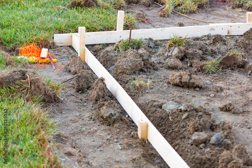Guides and Stakes In Ground At Construction Site Stock Photo | Adobe Stock