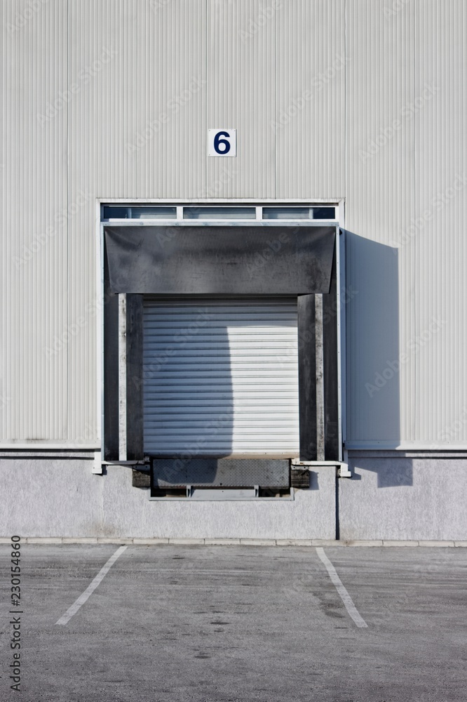 The cargo gate of a warehouse or a logistics center. Unloading ramp ...