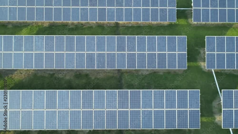 Aerial drone view of the solar panels in solar farm for green energy ...