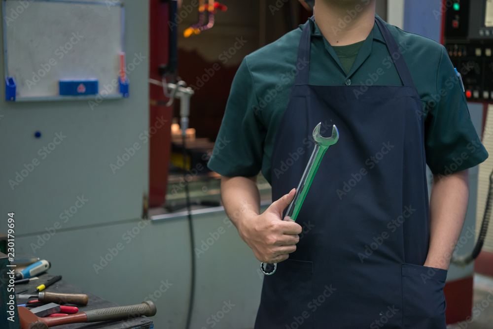 Mechanical engineer working at the plant of machine tools,Asian Lathe ...
