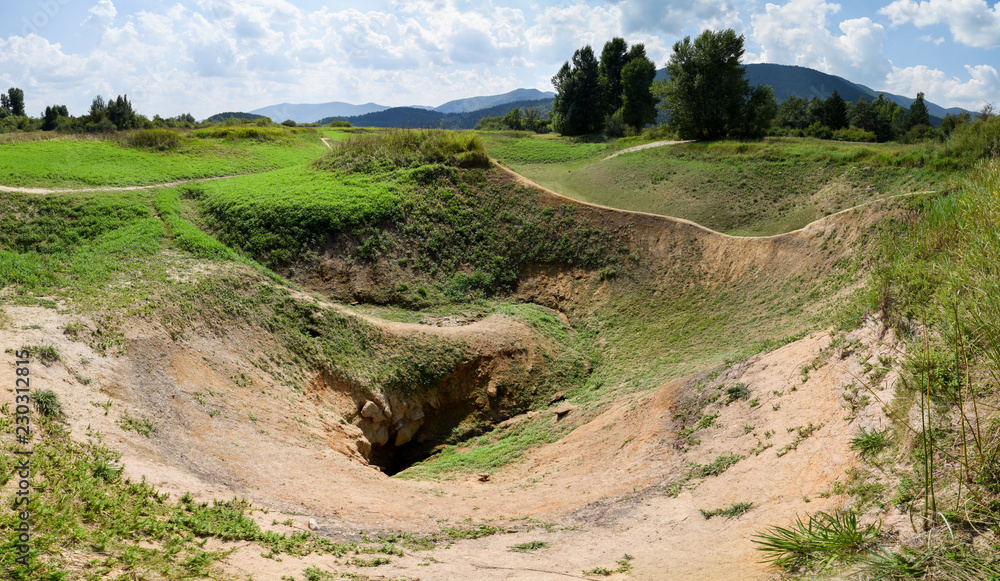Swallow hole (sink, sinkhole, ponor) Rešeto and Vodonos on Cerknica ...