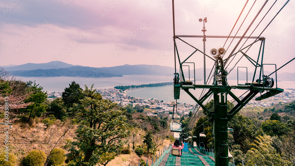 Chair lift service for travller to the mountain peak at Amanohashidate ...
