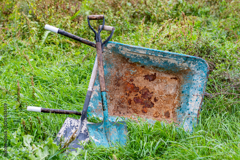 Wheelbarrow and tools Stock Photo | Adobe Stock