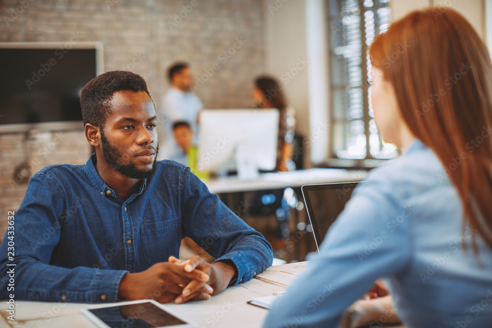 Young black man in a job interview Stock Photo | Adobe Stock
