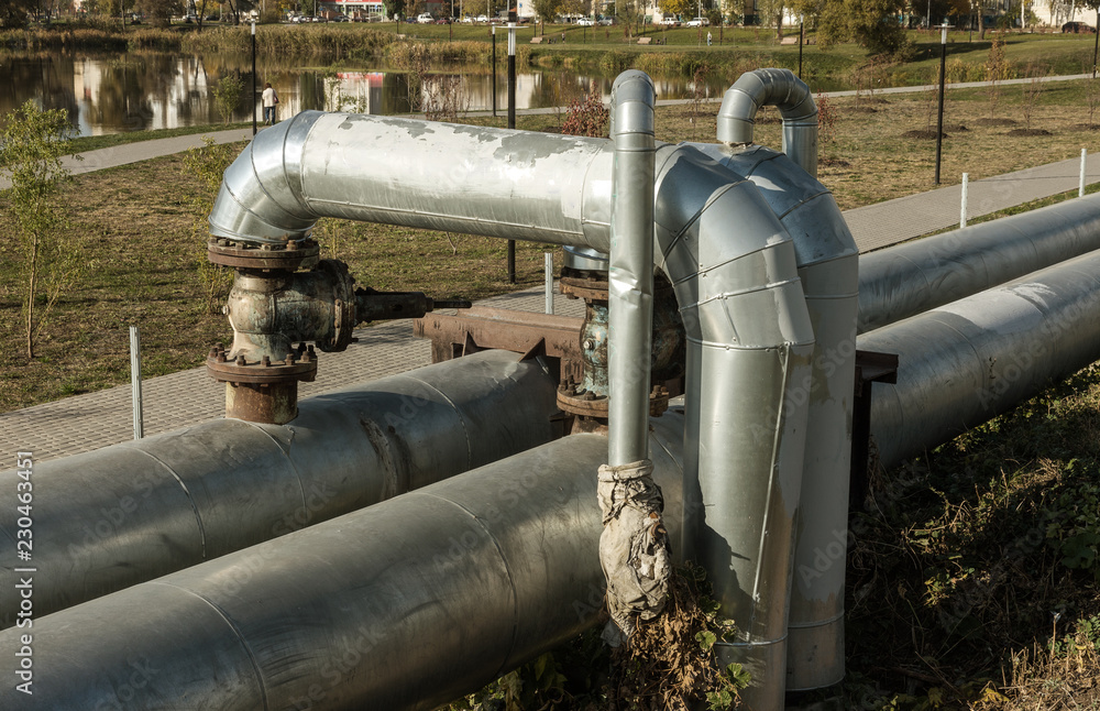 Modern Elevated Heat Pipes. Pipeline above ground, conducting heat to ...