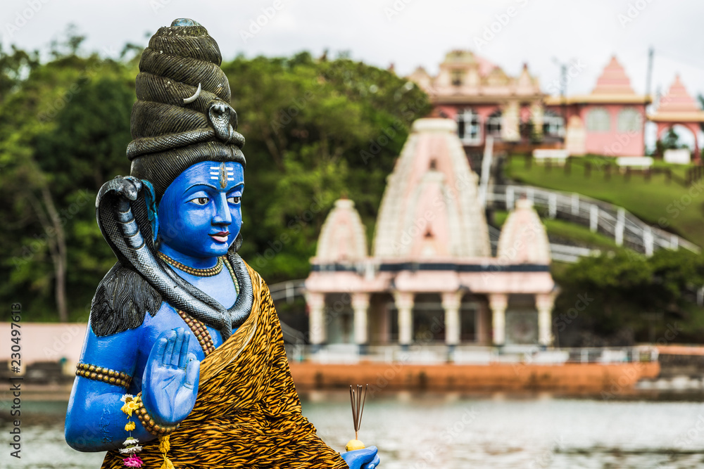 Statue of an indian (hindu, buddhist) divinity: Shiva in a hindu temple ...