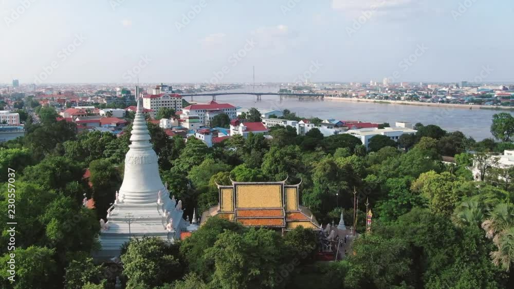 Aerial drone view fly past Wat Phnom in Phnom Penh, Cambodia, a holy ...