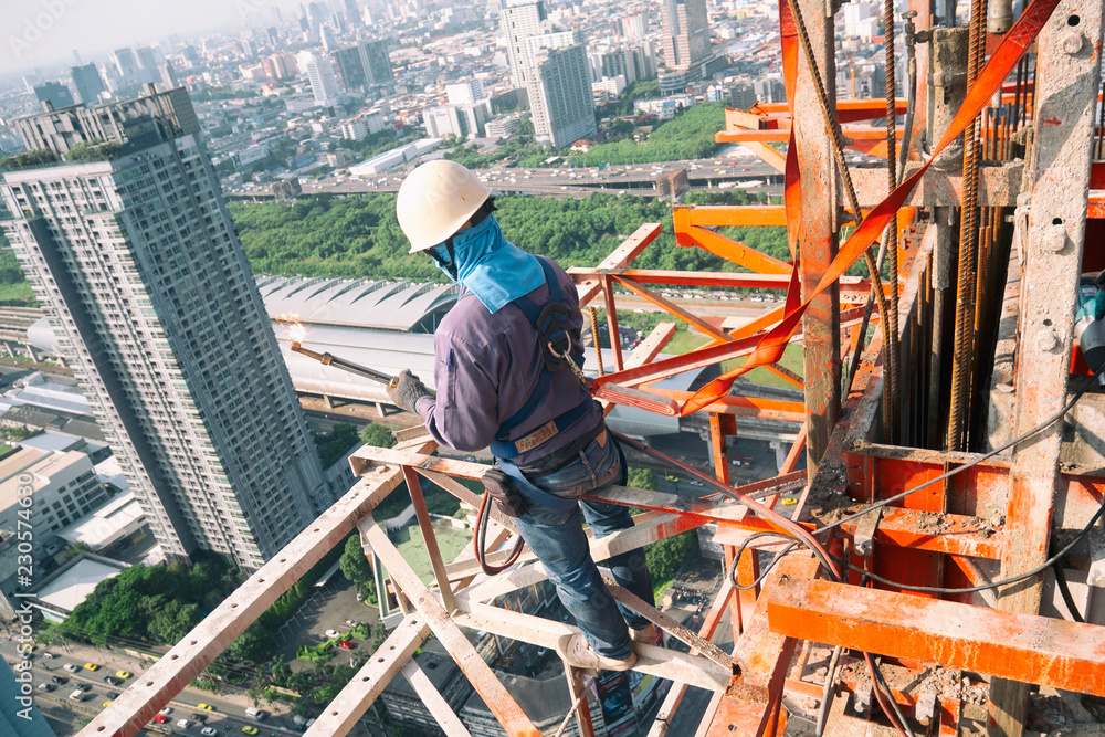 Construction worker wear standard personal protective equipment ...