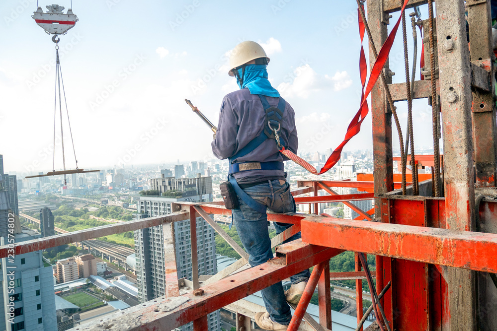Construction worker wear standard personal protective equipment ...