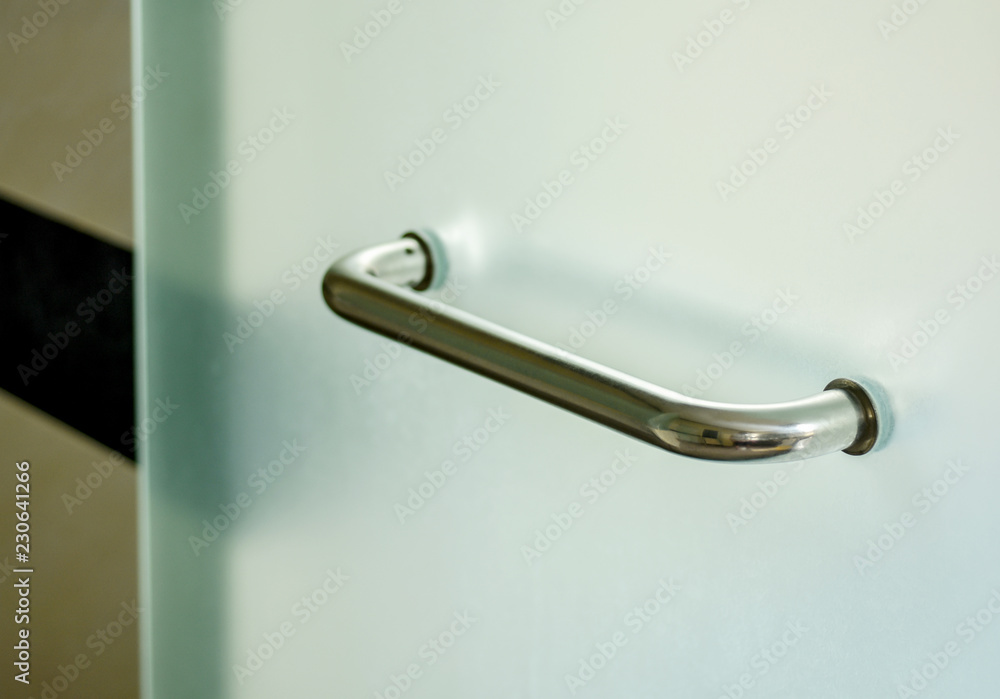 Poster Glass door handle of a glass partition shower unit – Wall Art ...