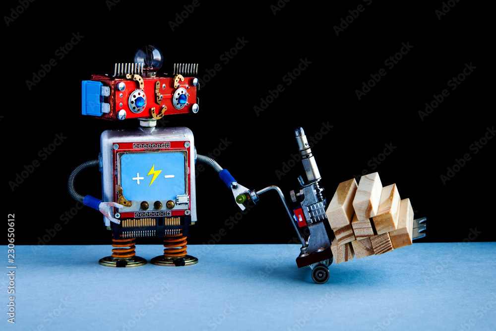Robot moving powered pallet jack with wooden blocks. Forklift cart ...