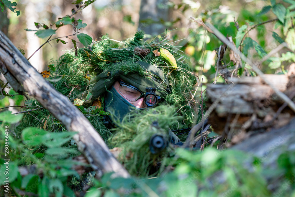 special forces, soldier assault rifle with silencer, optical sight ...